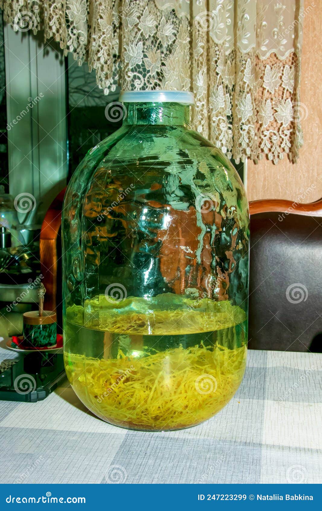 The Process of Preparing an Alcoholic Drink Limoncello at Home. Jar ...