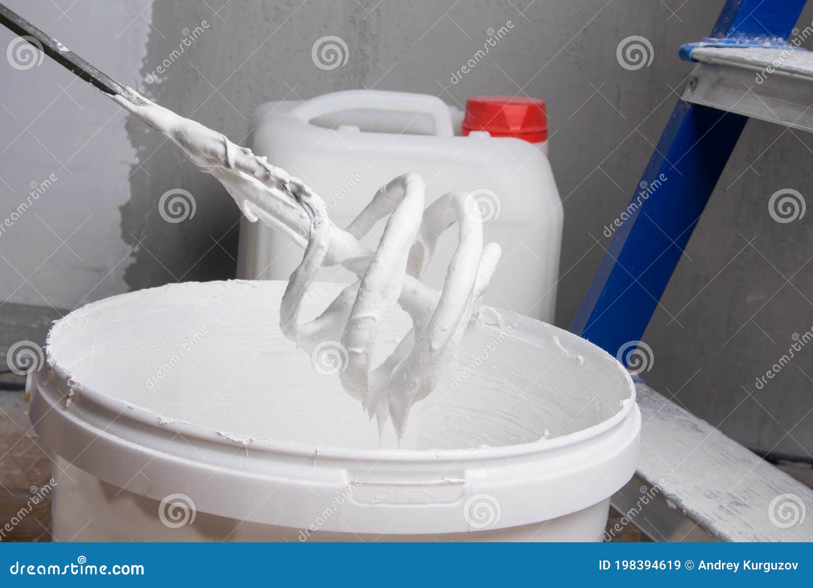 The Process of Preparing the Putty before Applying it To a Concrete ...