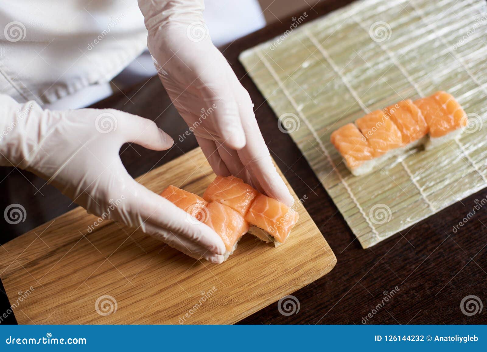 Process of Preparing Rolling Sushi Stock Photo - Image of gloves ...