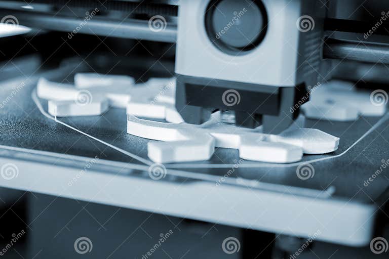 Process of Printing on 3D Printer. 3D Printer Creating Model from ...