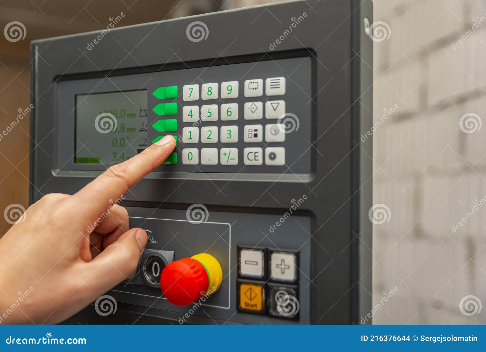 The Process of Programming a CNC Machine. Entering Data into a Computer ...