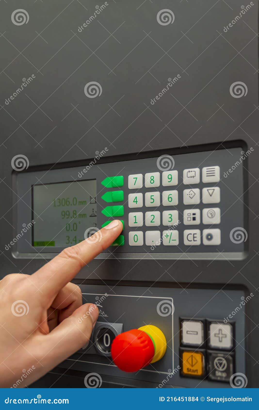 The Process of Programming a CNC Machine. Entering Data into a Computer ...