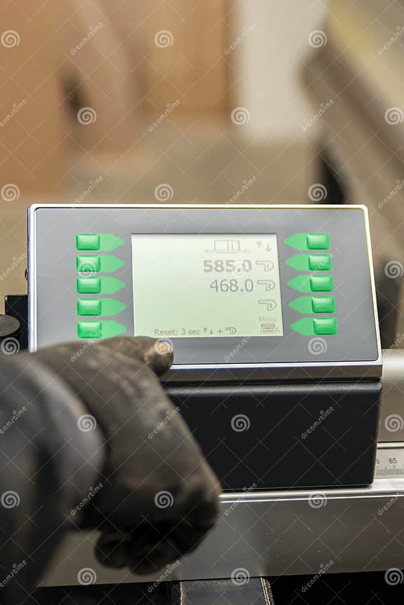 The Process of Programming a CNC Machine. Entering Data into a Computer ...