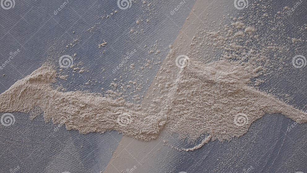 The Process of Removing Excess Putty from the Joints of the Playing ...