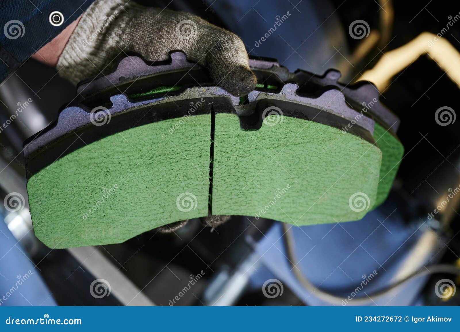 The Process of Replacing Brake Pads on a Regular Bus in a Workshop ...
