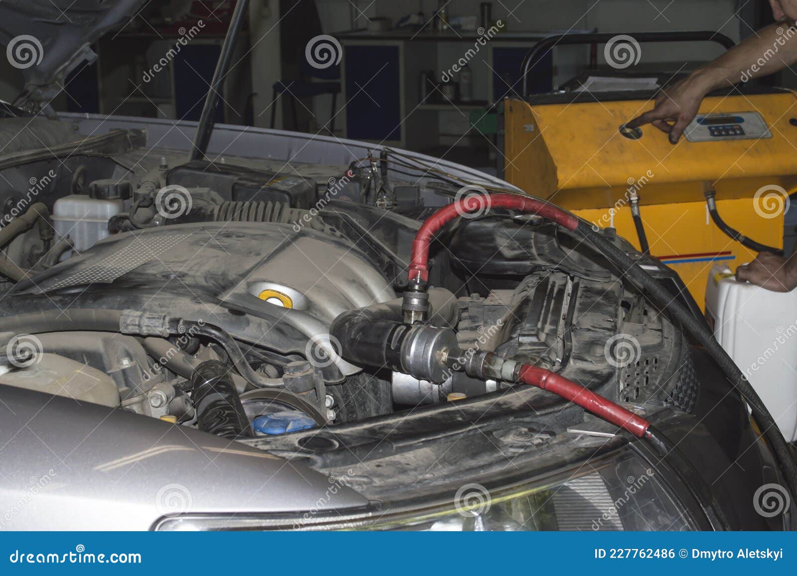 The Process of Replacing the Coolant on the Car with a Special Device ...