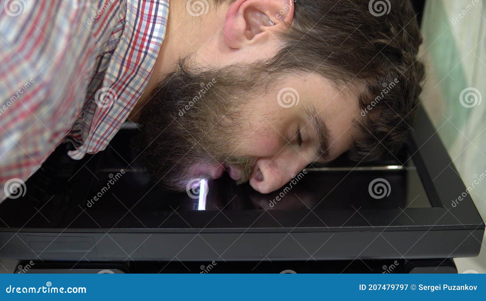 The Process of Scanning a Man& X27;s Face. Scanner in Operation Scans a ...