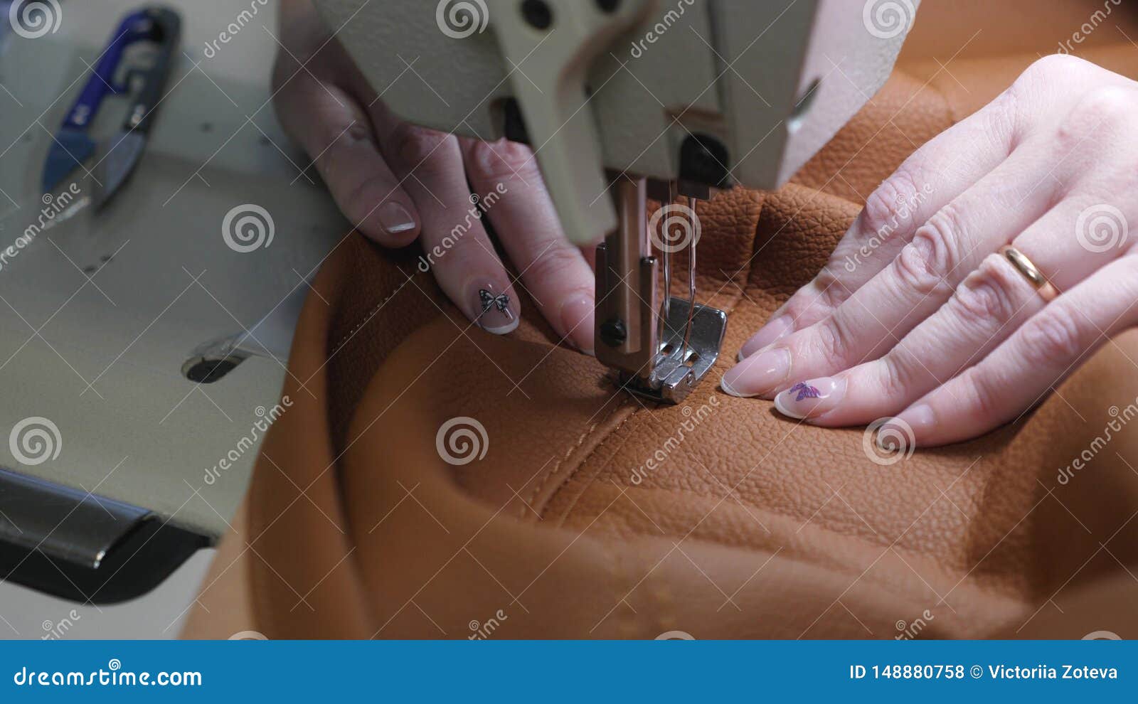 Process Of Sewing Artificial Leather. Needle Of Sewing Machine In ...