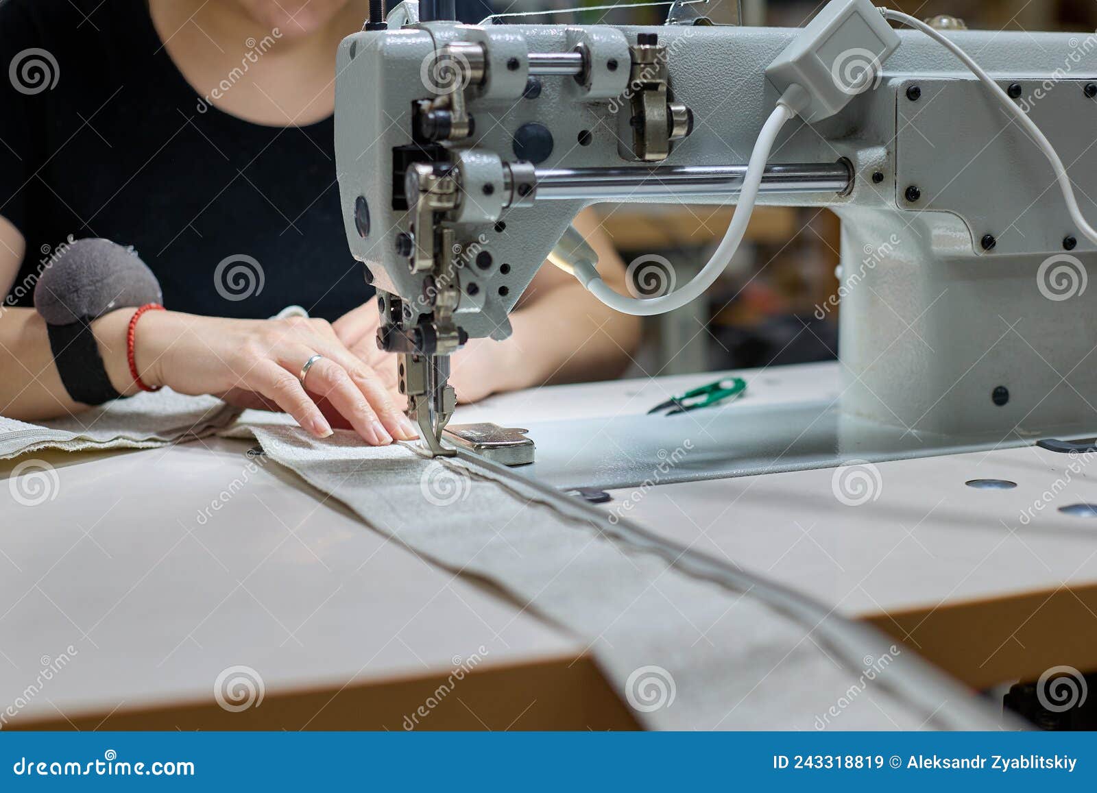 Process of sewing fabric. stock image. Image of material - 243318819