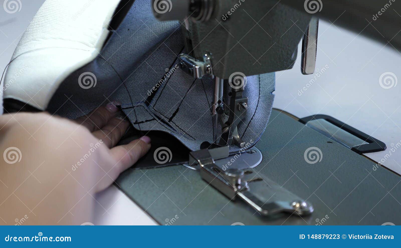 Process of Sewing Leather Goods. the Needle of the Sewing Machine in ...
