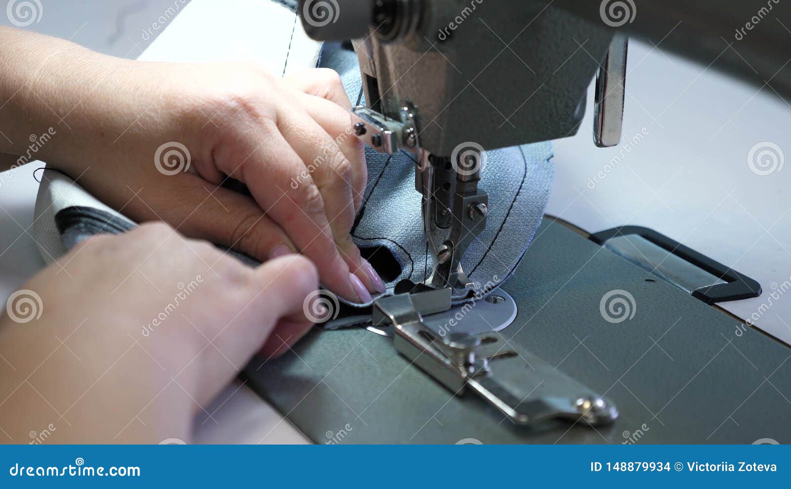 Process of Sewing Leather Goods. the Needle of the Sewing Machine in ...