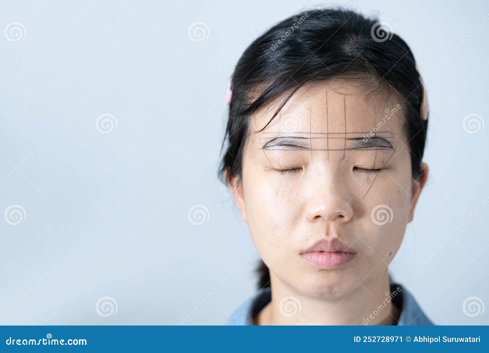 The Process of Shaping Eyebrows by a Beauty Master with a Thread for a ...