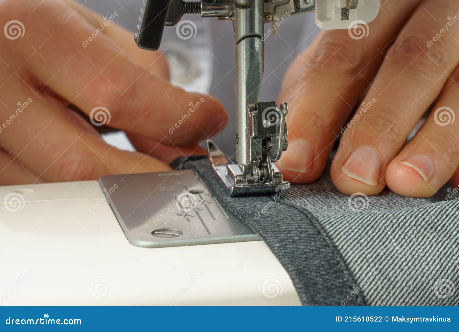 Process of Shortening Jeans Pants on a Sewing Machine Stock Photo ...