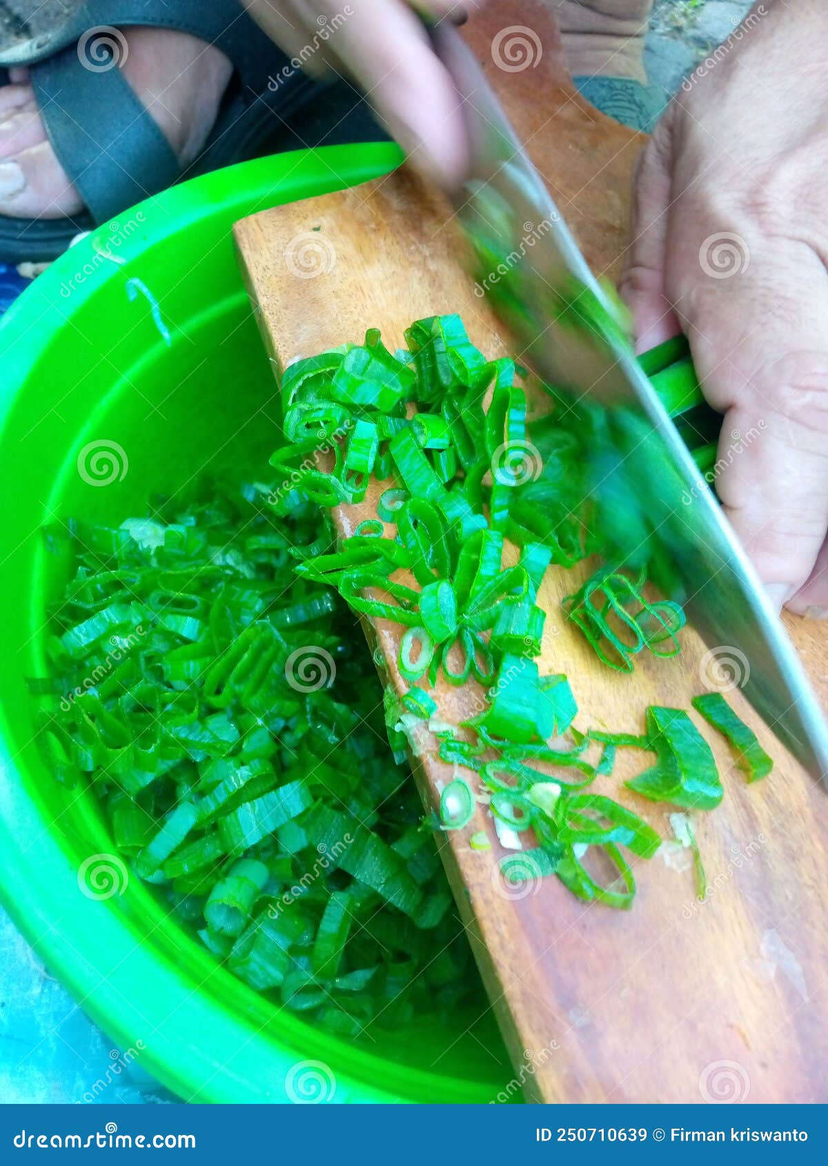 The Process of Slicing Scallions Using a Kitchen Knife Stock Image ...