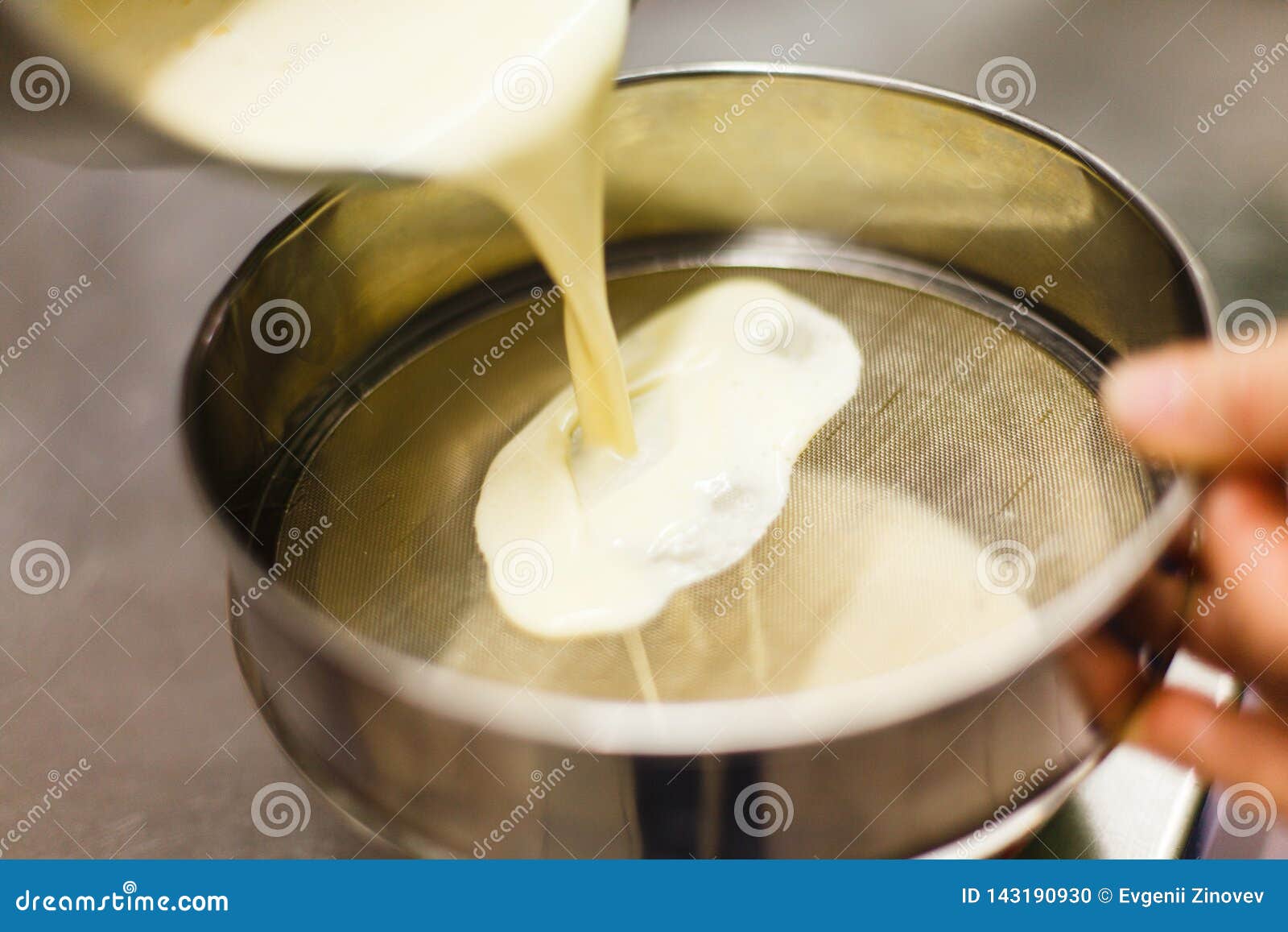 The Process of Straining when Preparing the Brule Cream Stock Photo ...