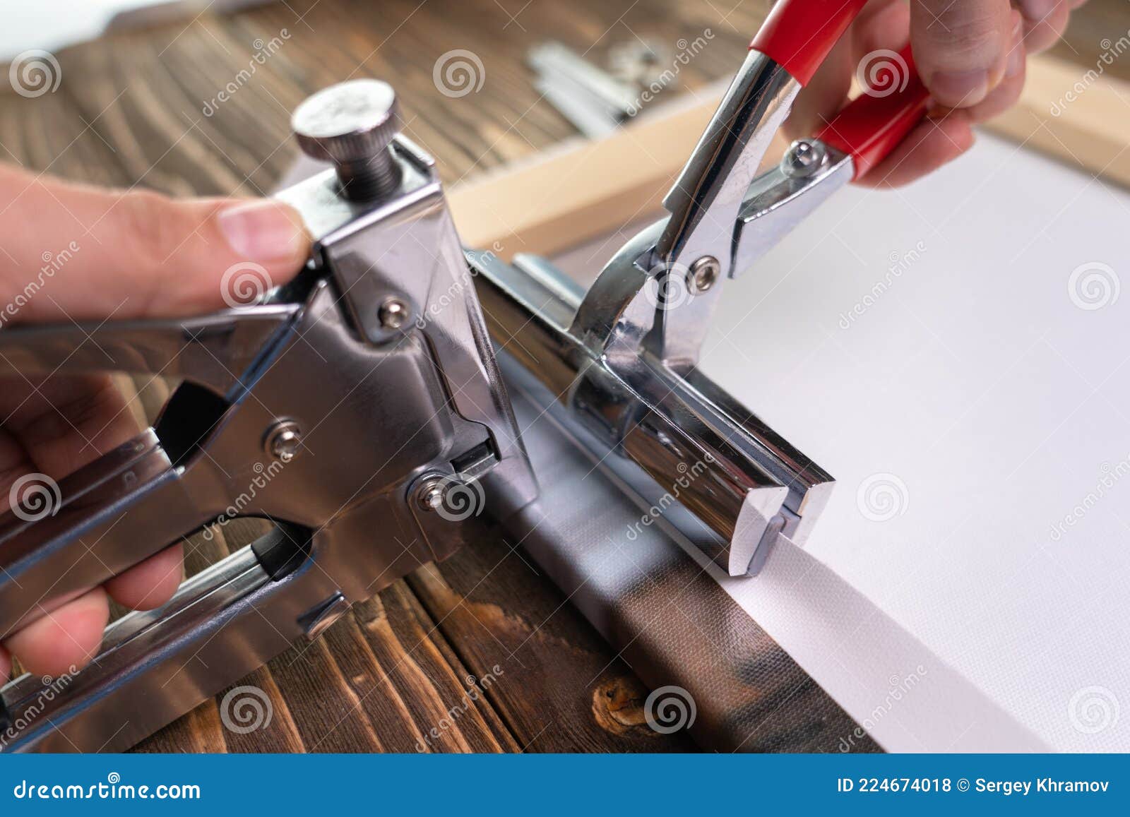 The Process of Stretching a Synthetic Canvas Onto a Stretcher. Hand ...