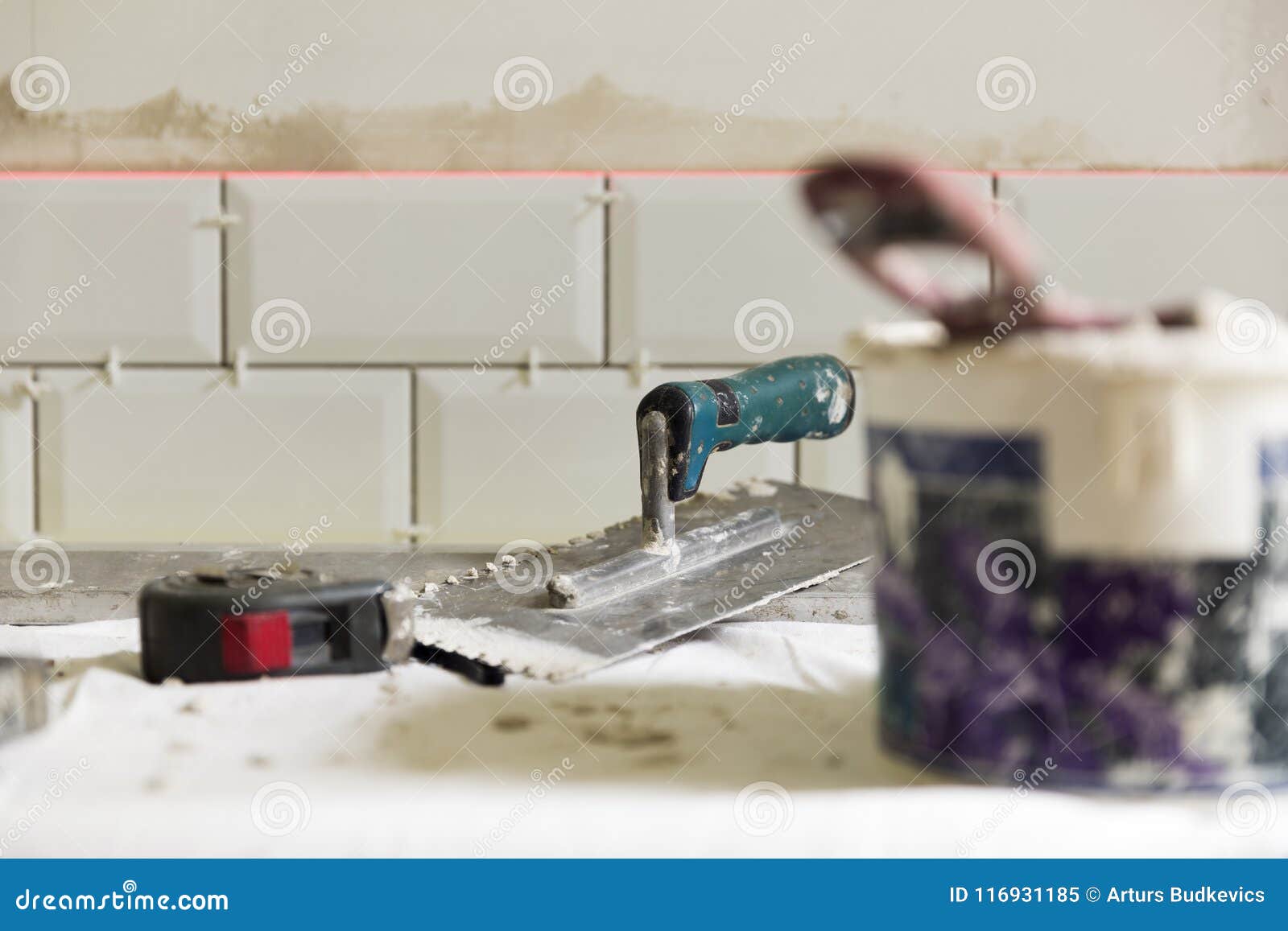 Process of Tiling the Tiles in the Kitchen with Necessary Tiling Stock ...