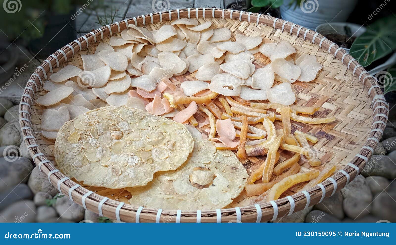 The Process To Dry the Crackers Inside a Woven Bamboo Container Stock ...