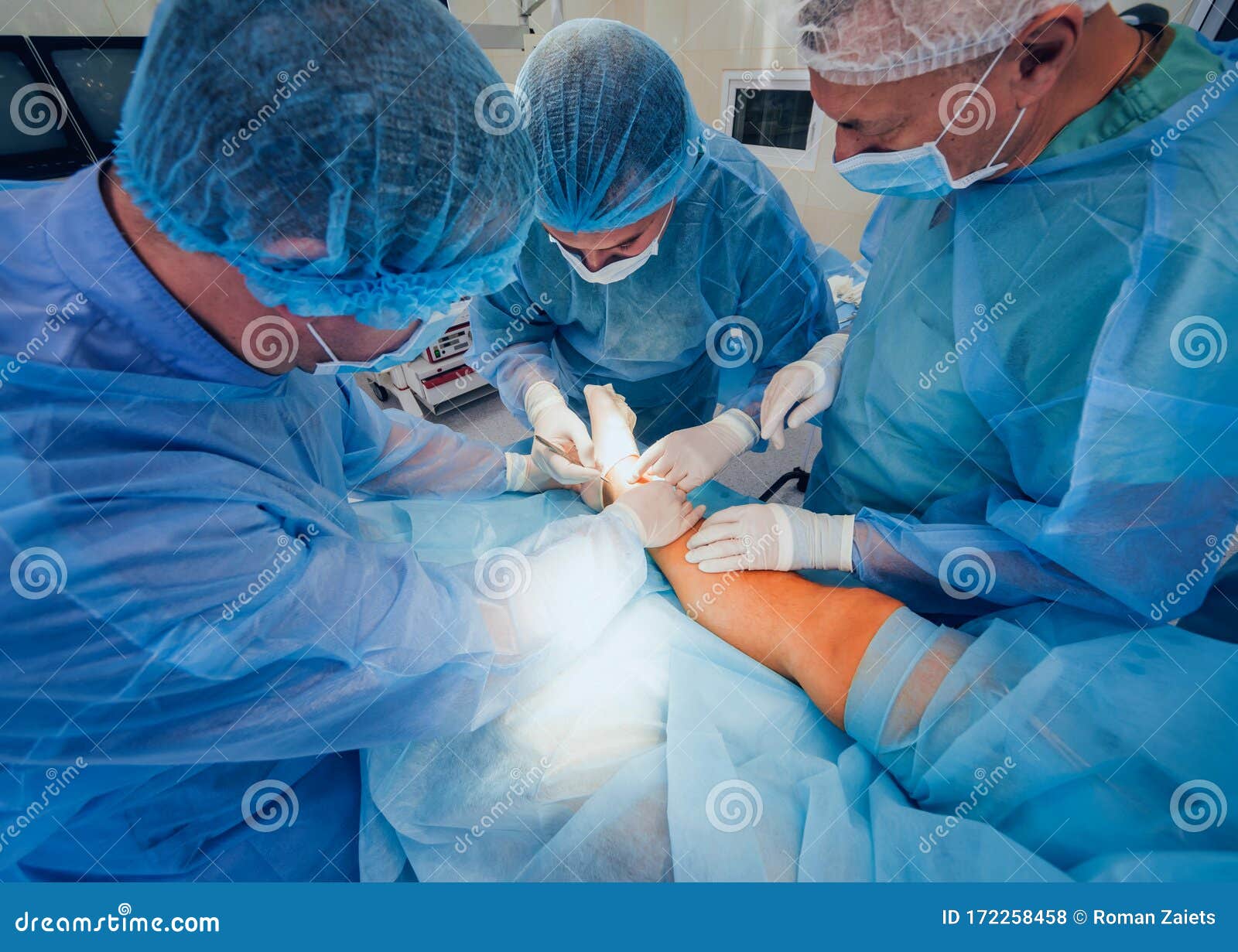 Process of Trauma Surgery Operation. Group of Surgeons in Operating ...