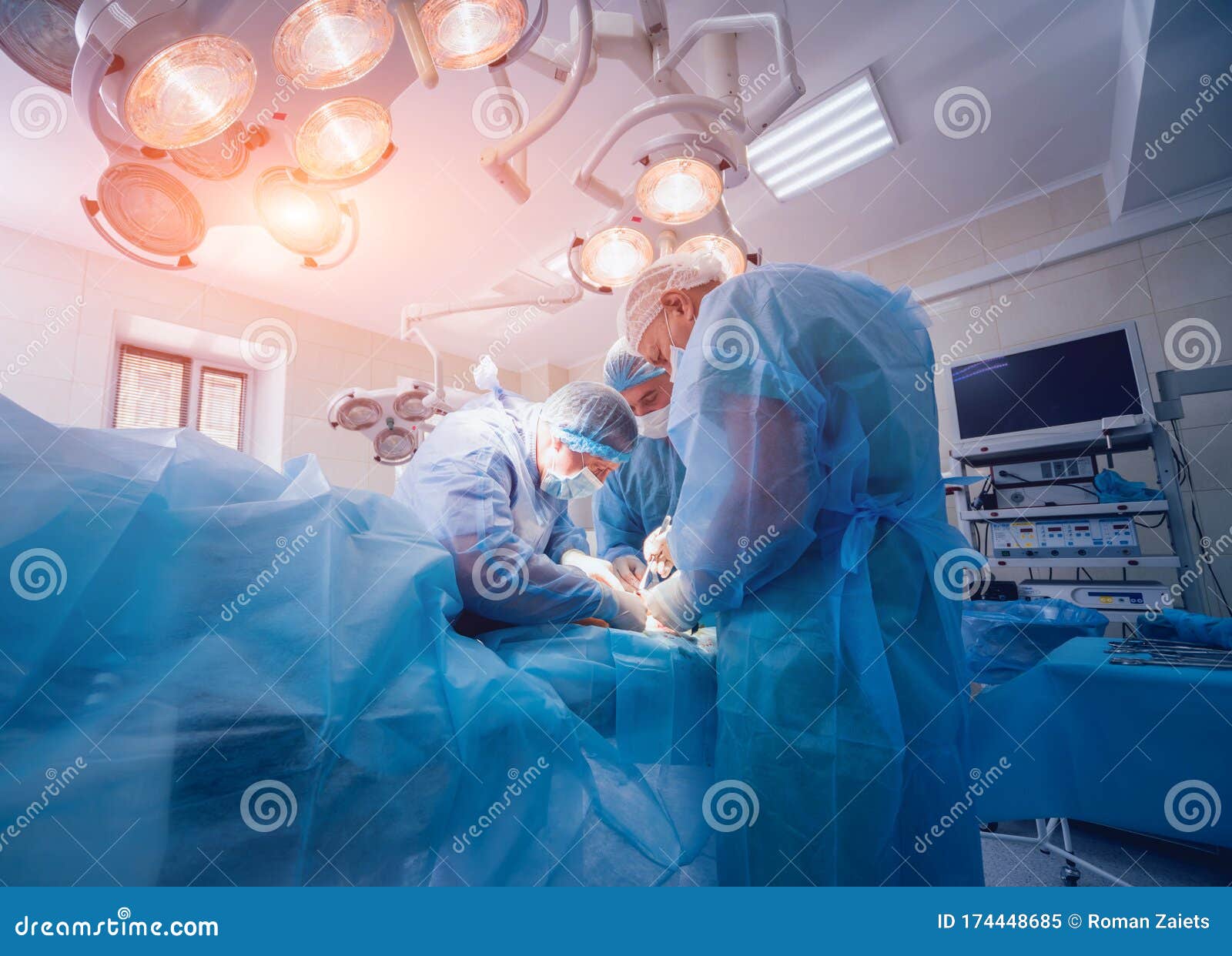 Process of Trauma Surgery Operation. Group of Surgeons in Operating ...