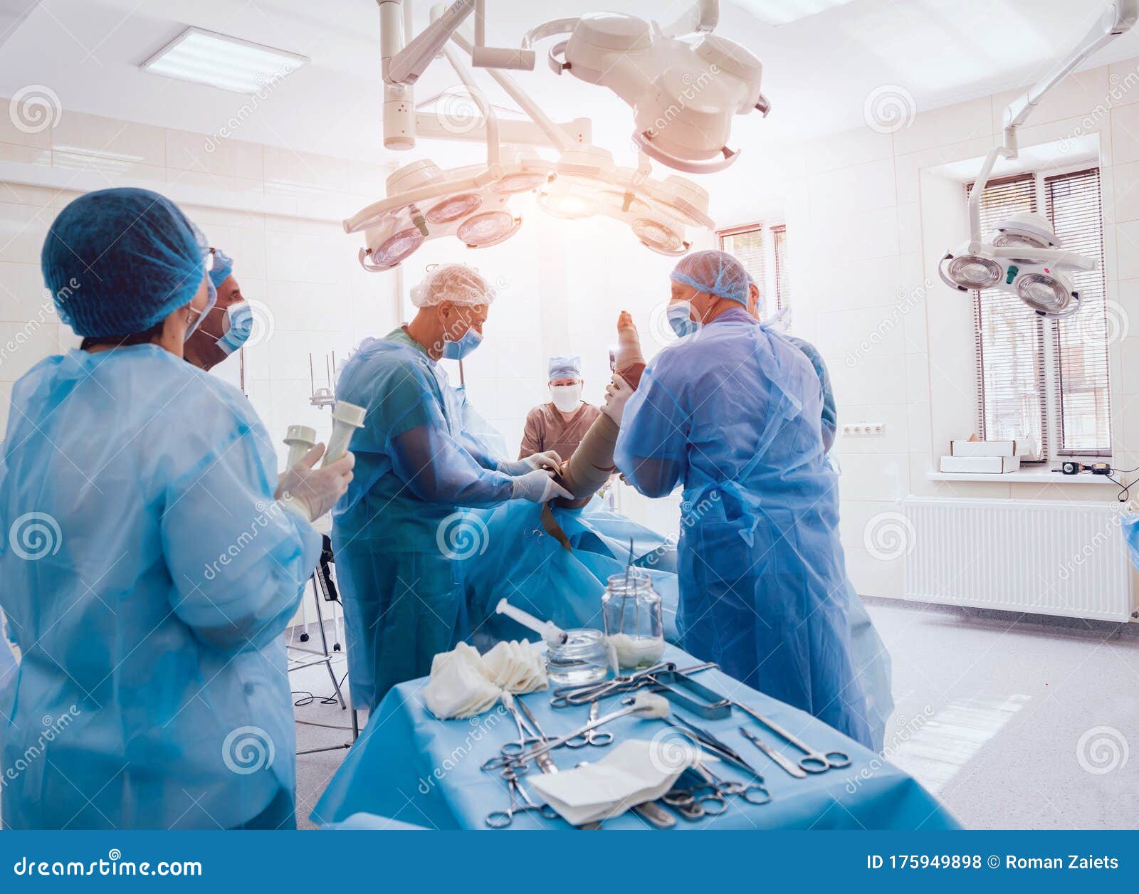 Process of Trauma Surgery Operation. Group of Surgeons in Operating ...