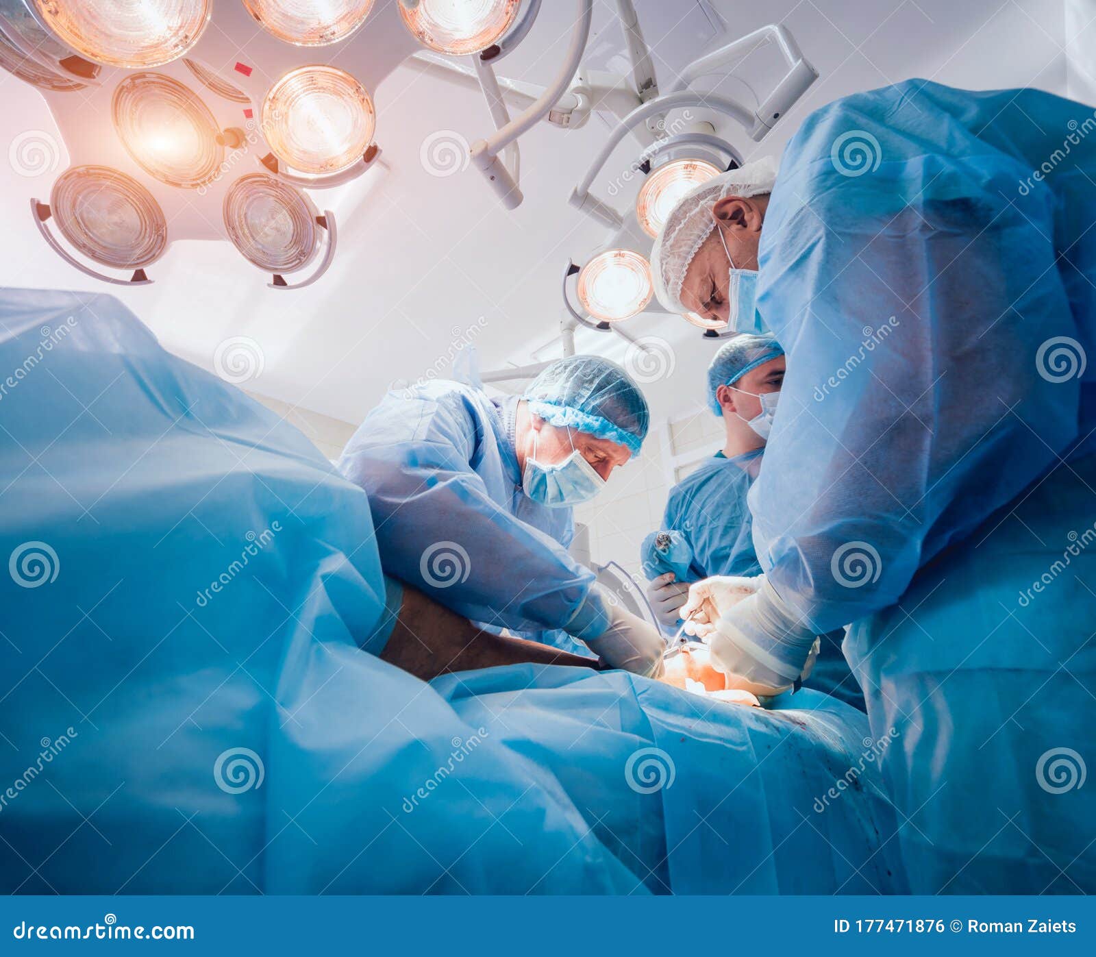 Process of Trauma Surgery Operation. Group of Surgeons in Operating ...