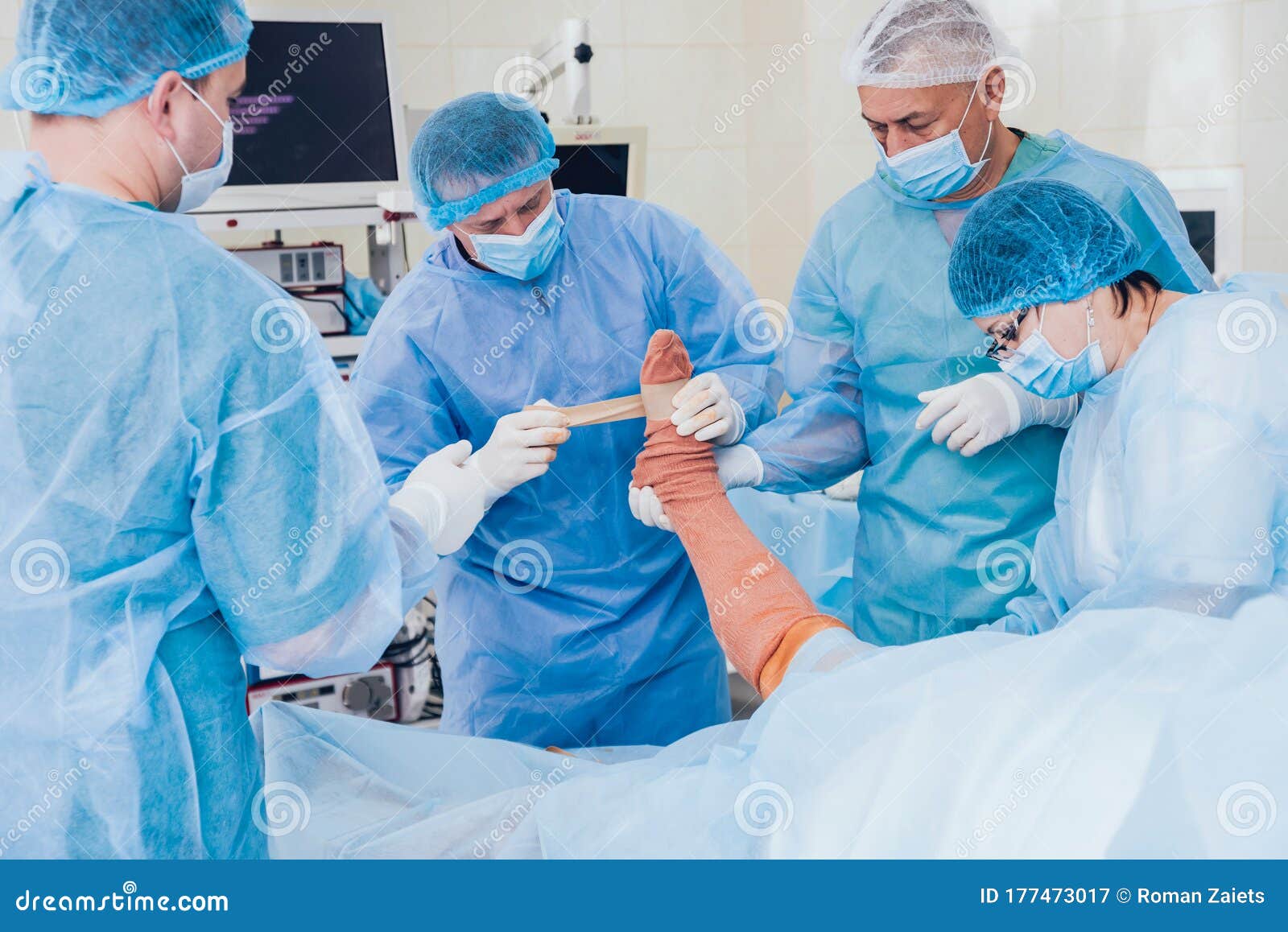 Process of Trauma Surgery Operation. Group of Surgeons in Operating ... Process of Trauma Surgery Operation. Group of Surgeons in Operating ...