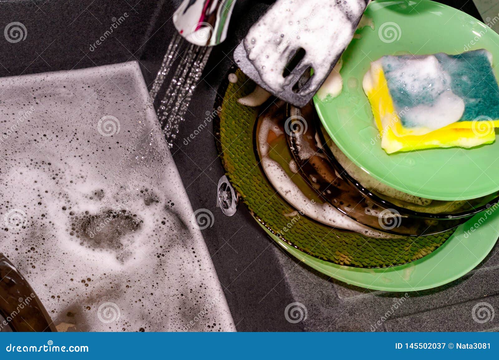 The Process of Washing Plates in the Sink, Hands and Plates Closeup ...