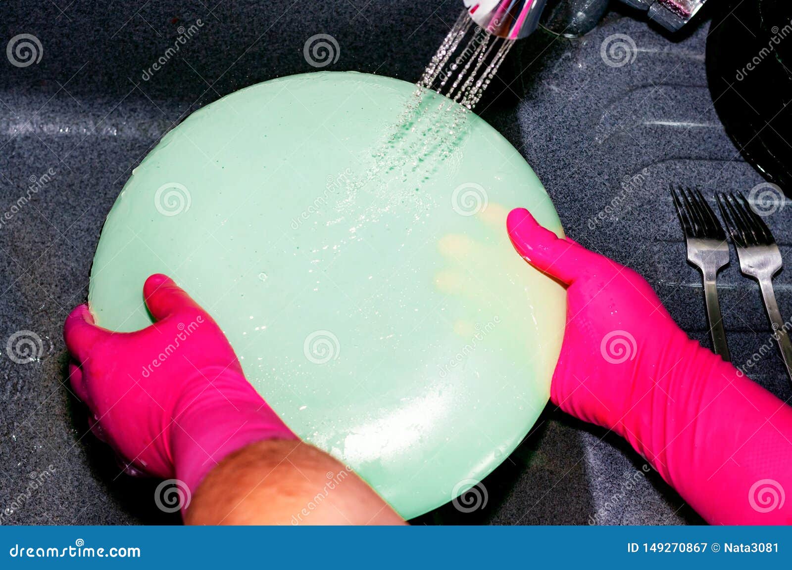 The Process of Washing Plates in the Sink, Hands and Plates Closeup ...