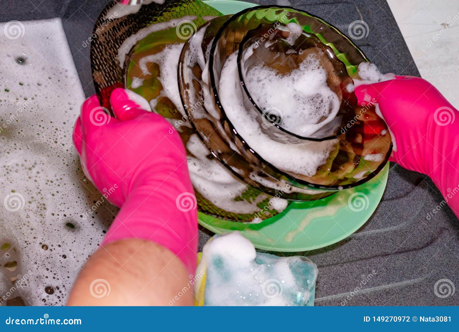 The Process of Washing Plates in the Sink, Hands and Plates Closeup ...