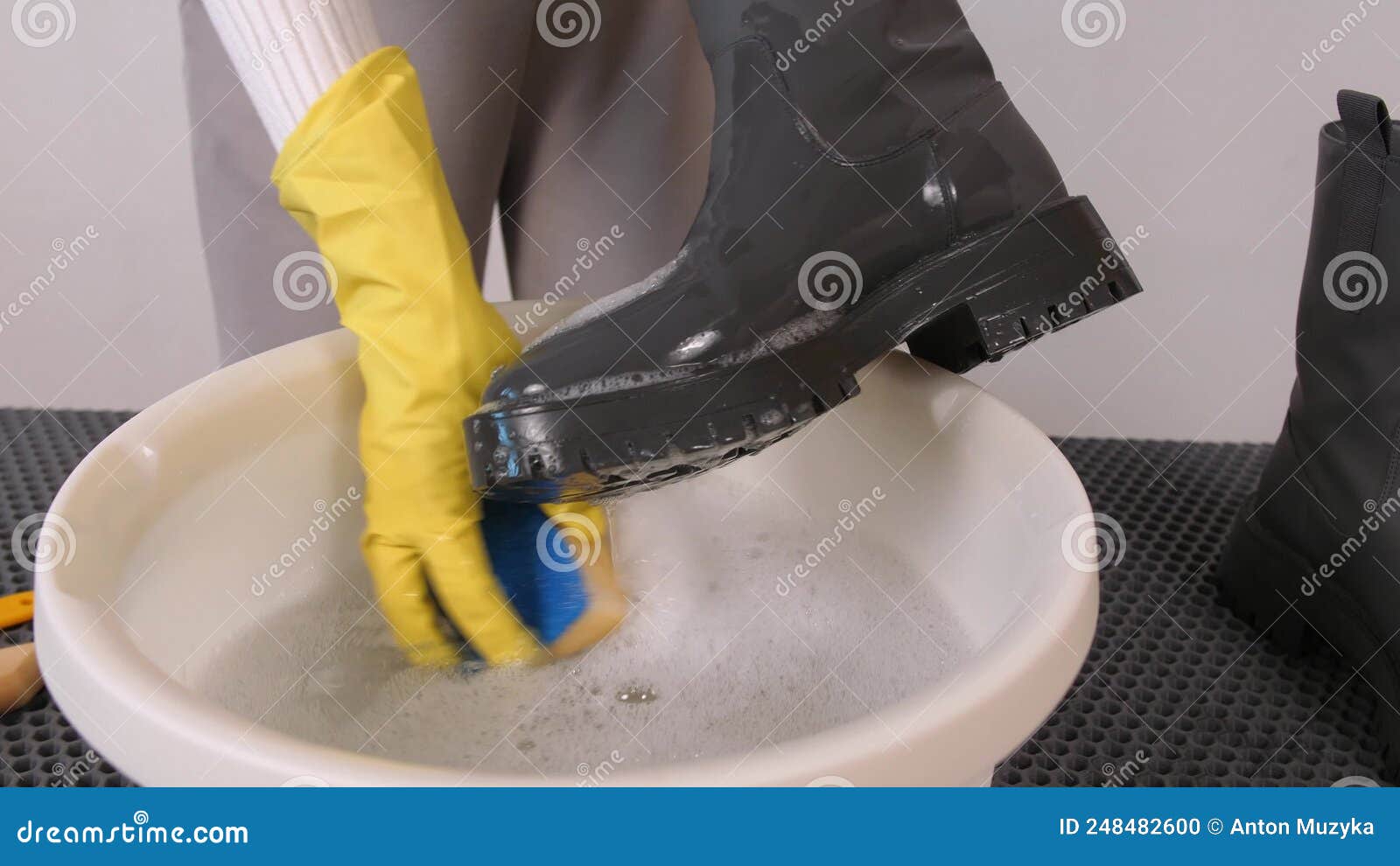The Process of Washing Shoes with Foam Using a Sponge with Rubber ...