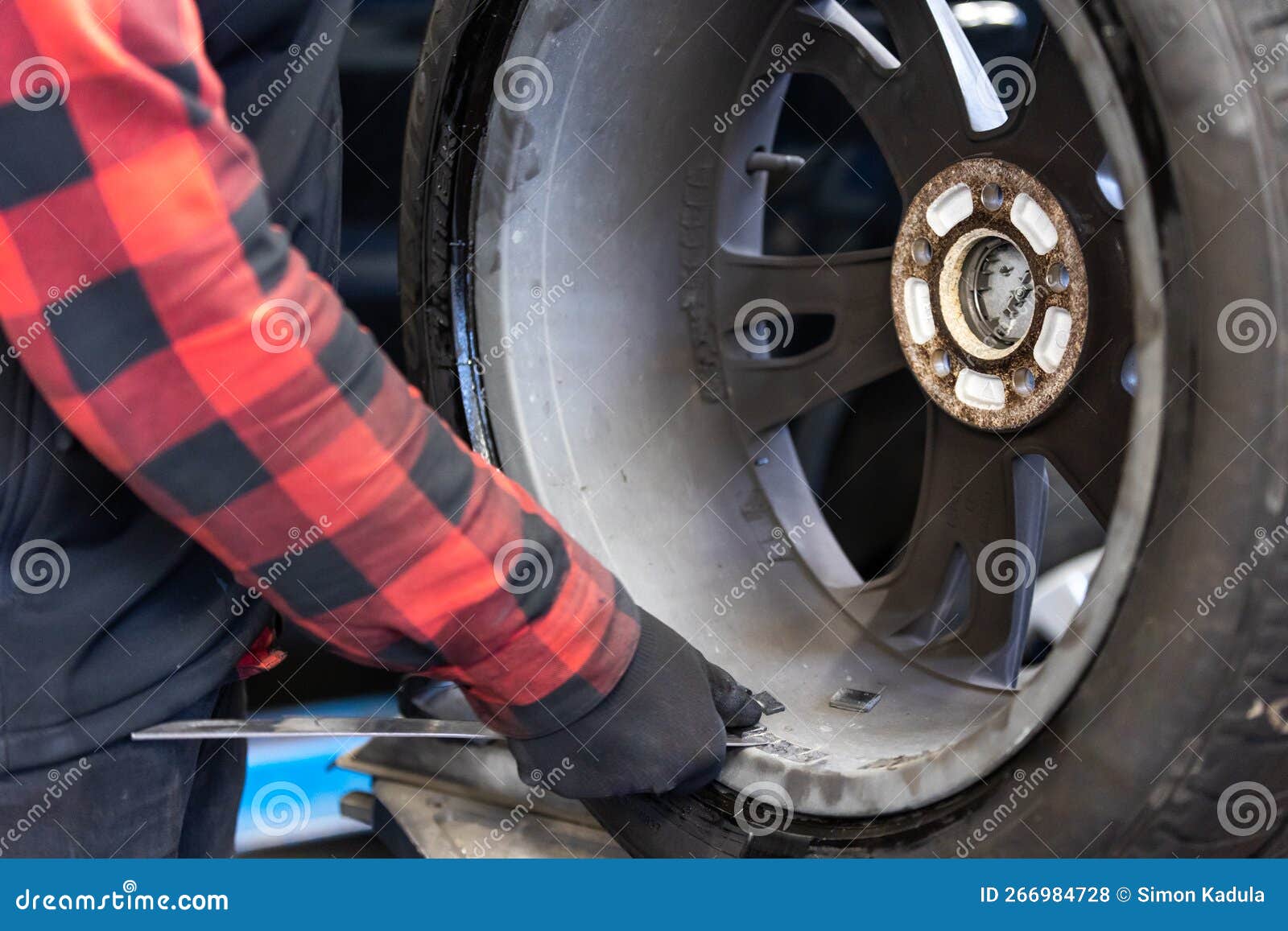Process of Wheel Balancing at Car Service, Transport Concept Stock ...