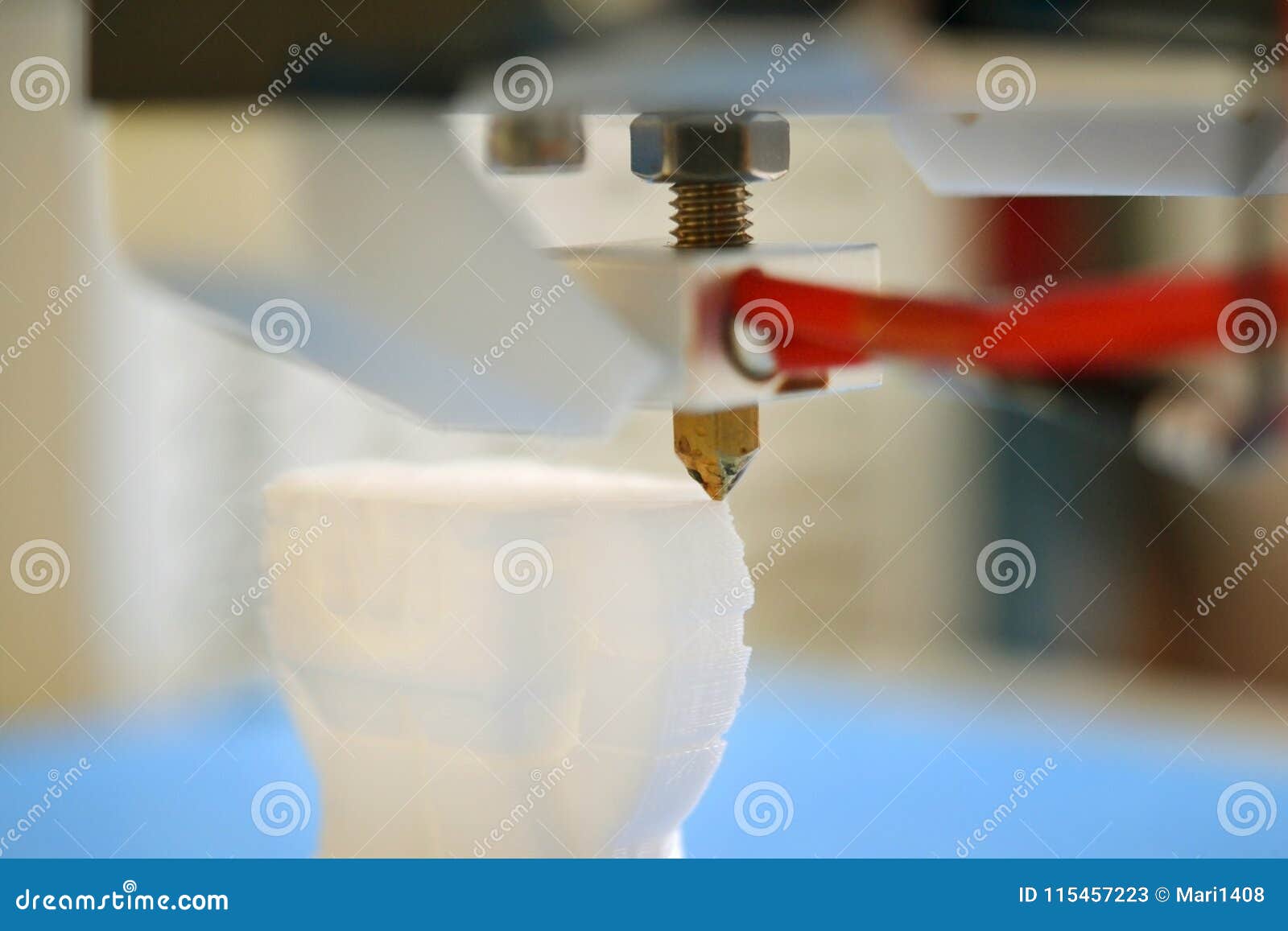 The Process of Working 3D Printer and Creating a Three-dimensional ...