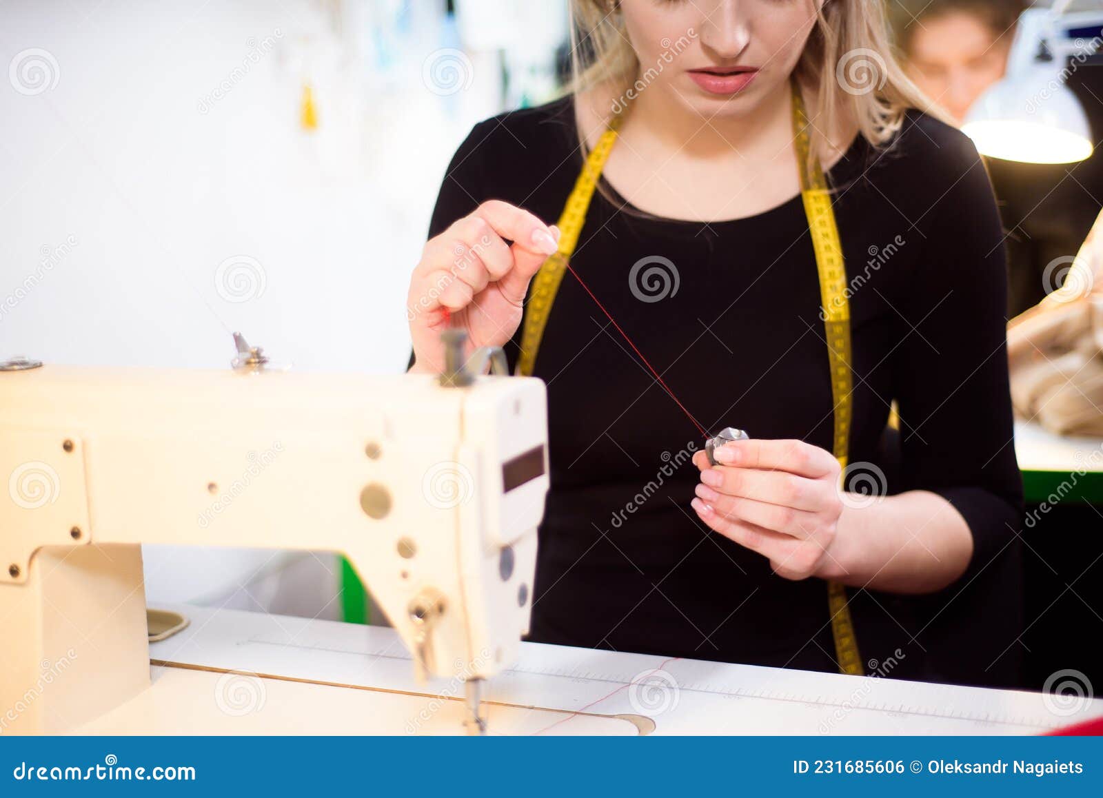 Process of Working with Sewing Machine in an Atelier. Stock Photo ...