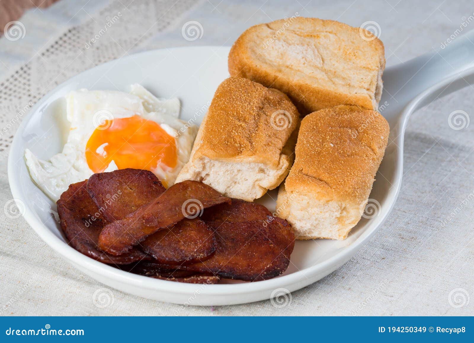 Processed Meat with Egg and Pandesal Filipino Bread for Breakfast Stock ...