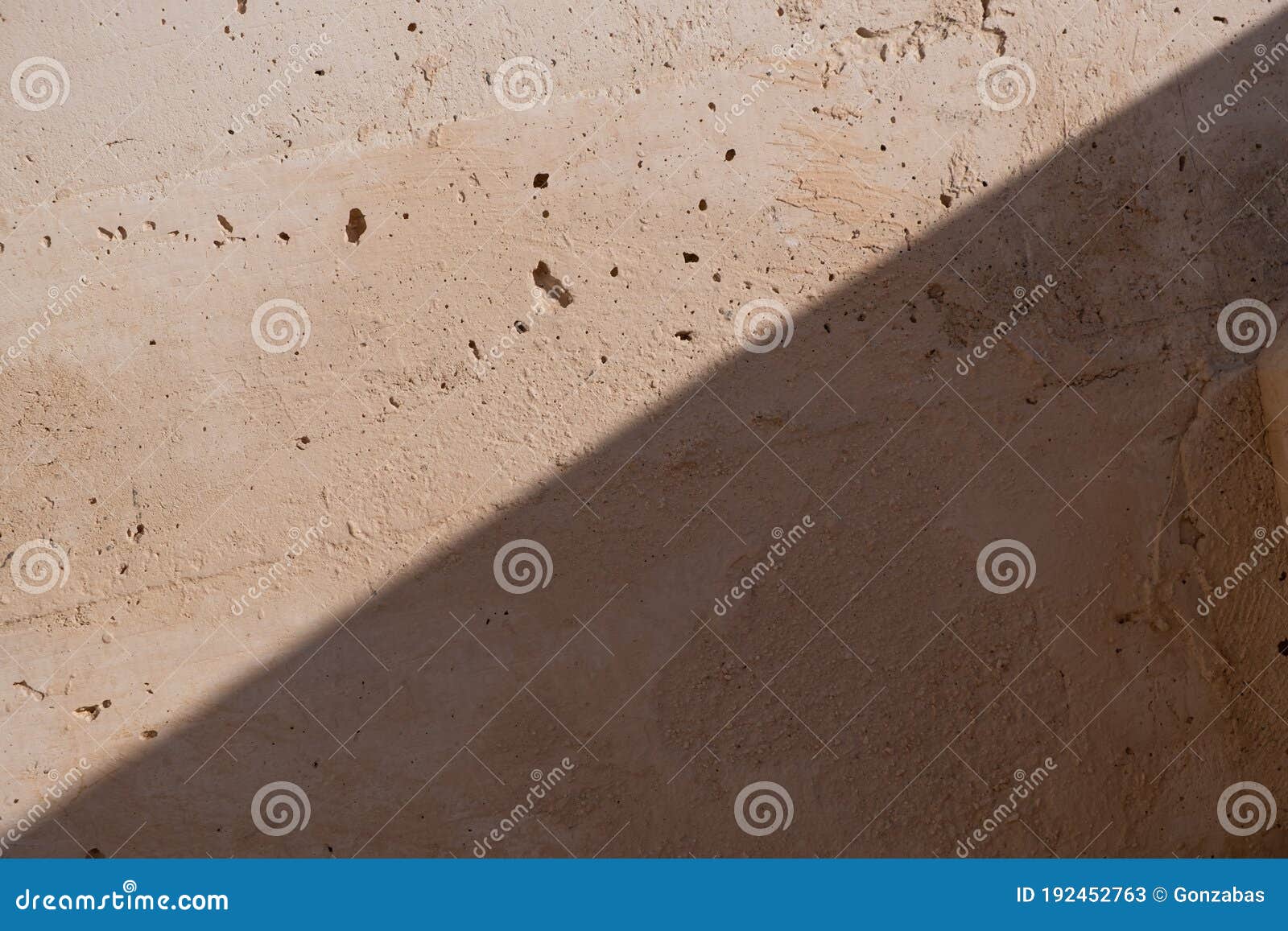 Processed Sandstone Wall with Diagonal Line between Light and Shadow ...