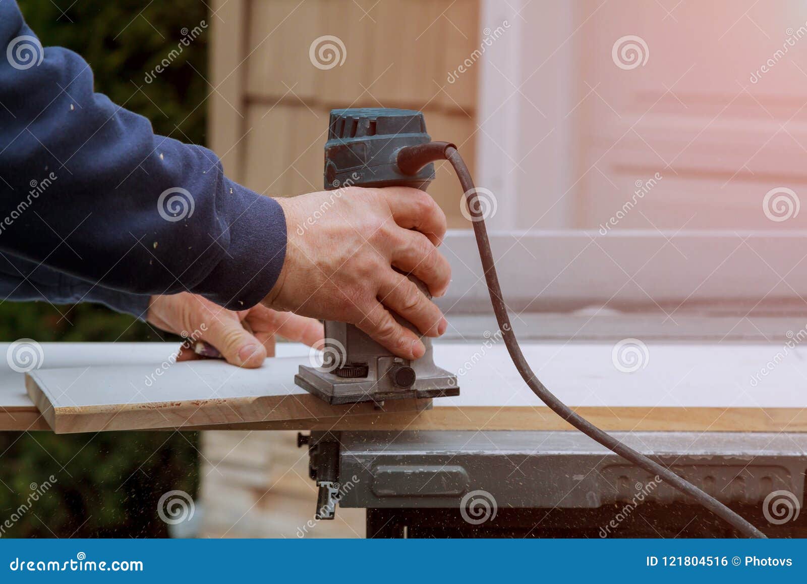Processing Carpenter with Electronic Plunge Router of Wooden Boards ...