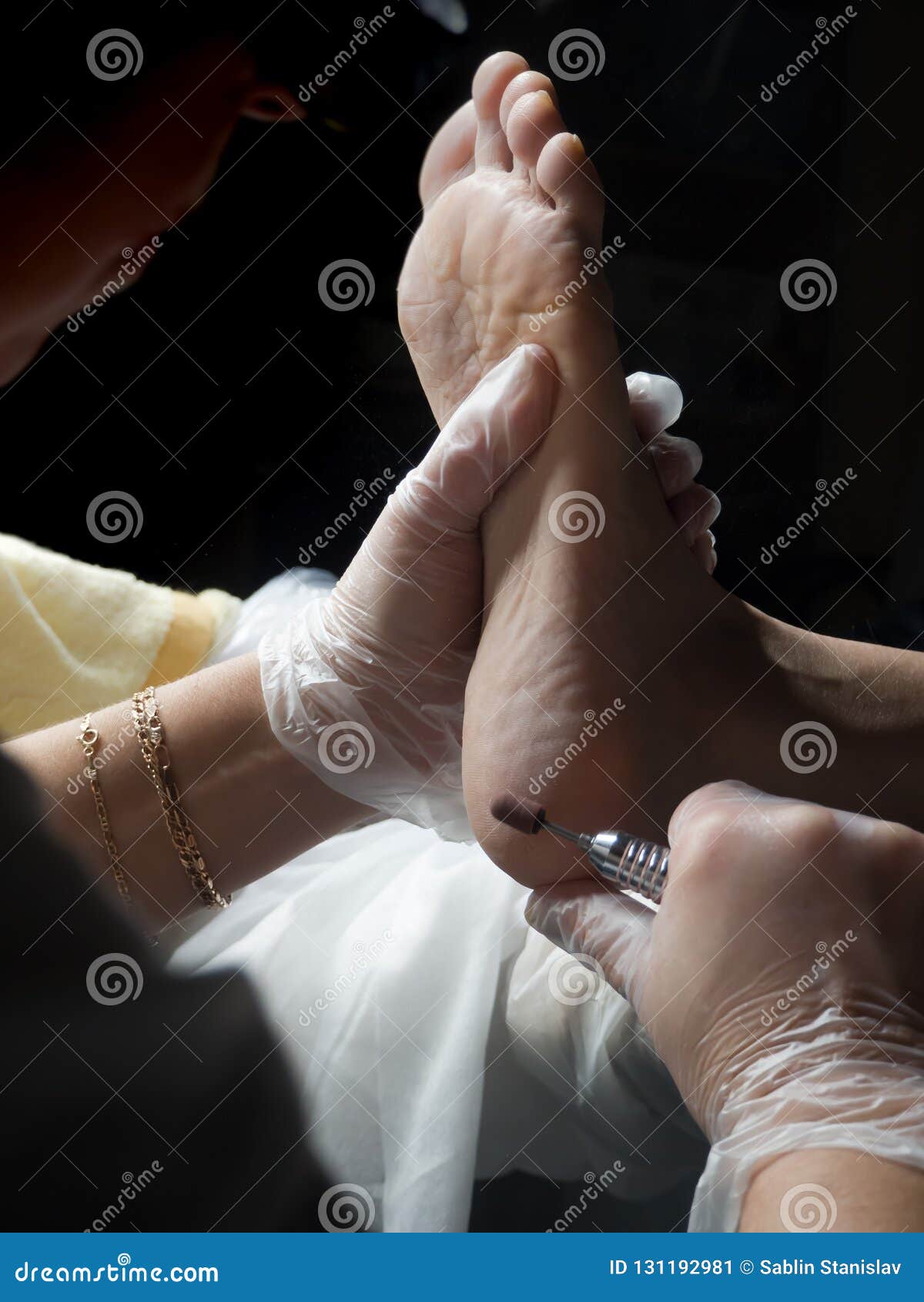 Processing Foot Cutter. Pedicure in the Beauty Salon. Stock Image ...