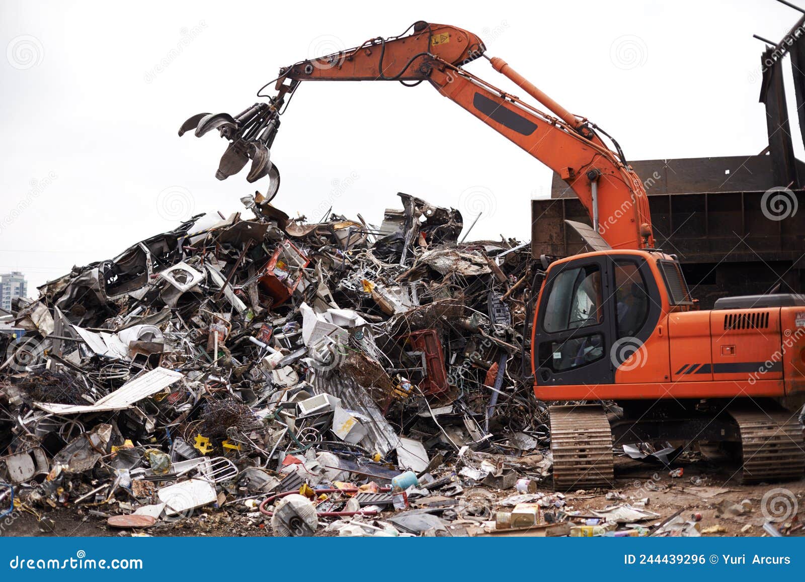 Processing Industrial Trash. Cropped Shot of a Crane at Work in a ...