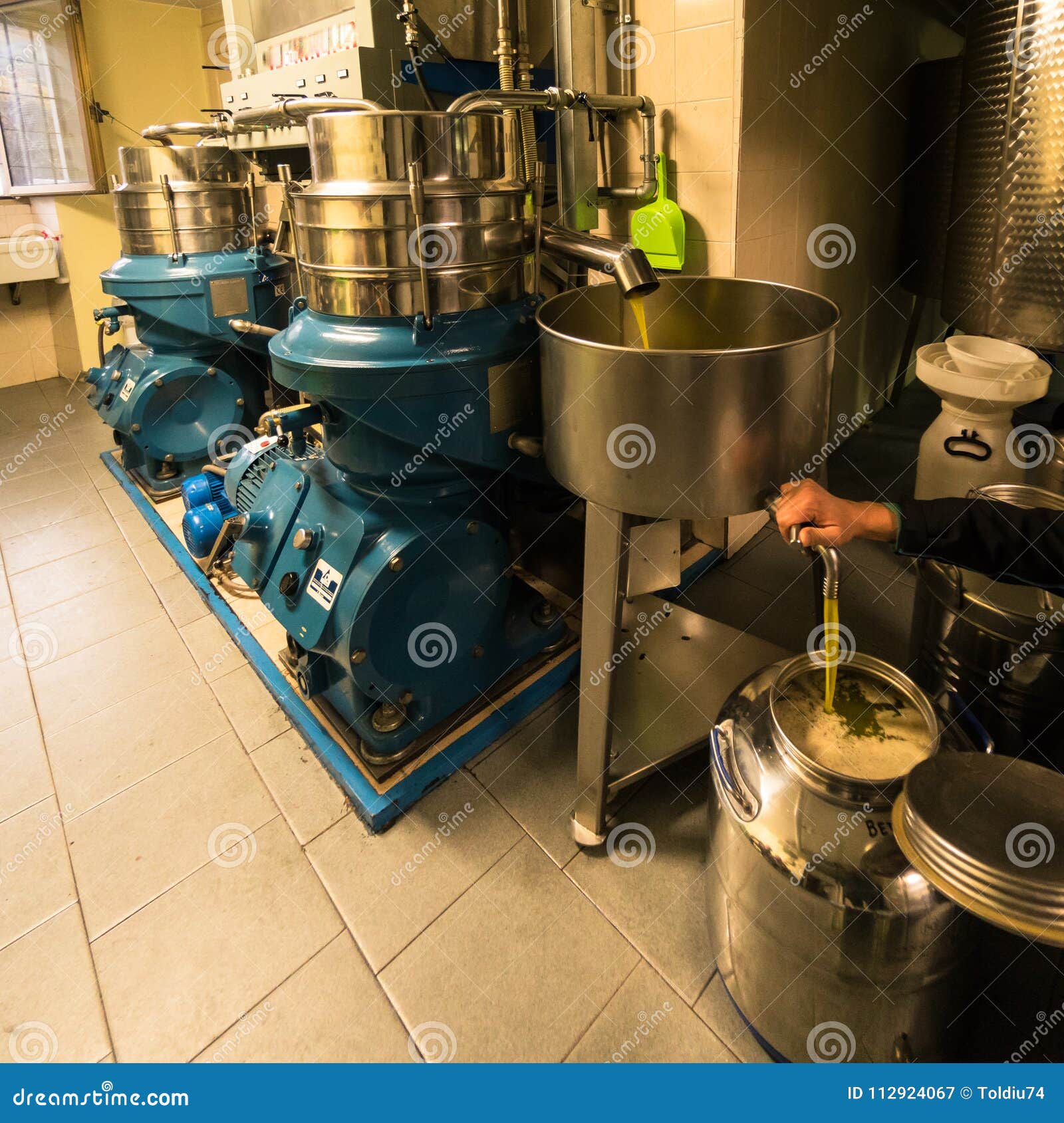 Processing of Olive Oil in a Modern Farm. Stock Image - Image of flow ...