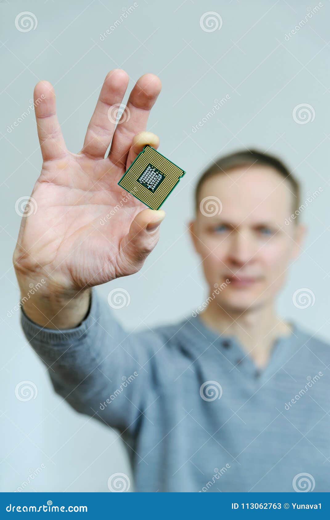 CPU in the man`s hand. stock image. Image of close, processor - 113062763