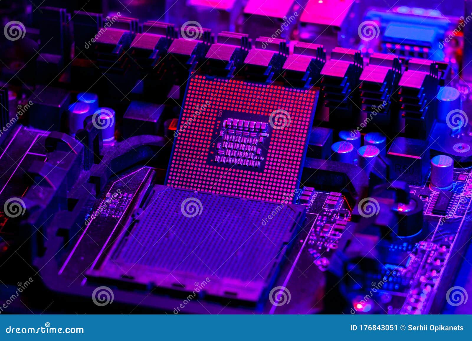 The Processor on the Motherboard in Neon Light. Computer Parts Stock ...