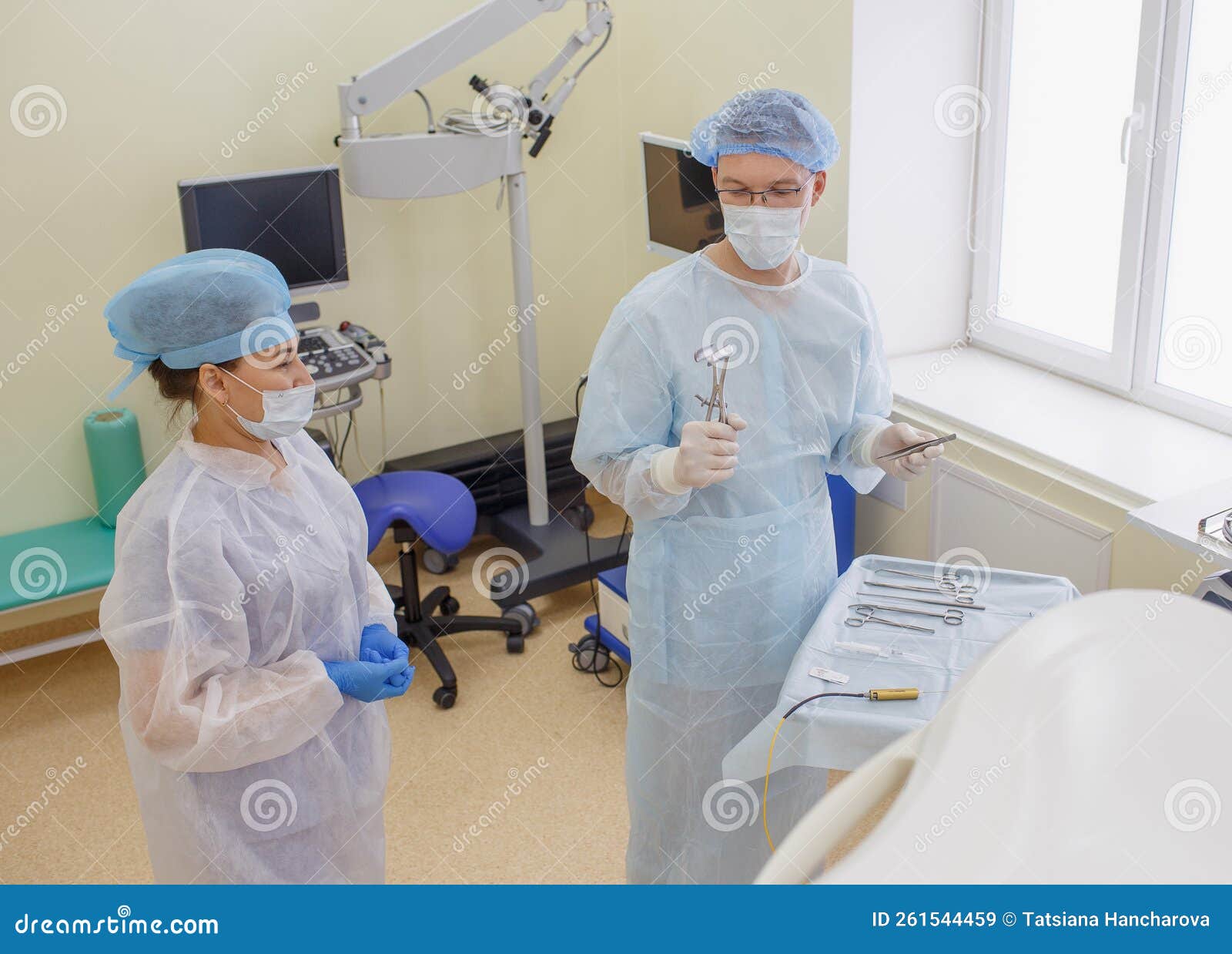A Proctologist Prepares Expansion Instruments for Surgery in the ... A Proctologist Prepares Expansion Instruments for Surgery in the ...
