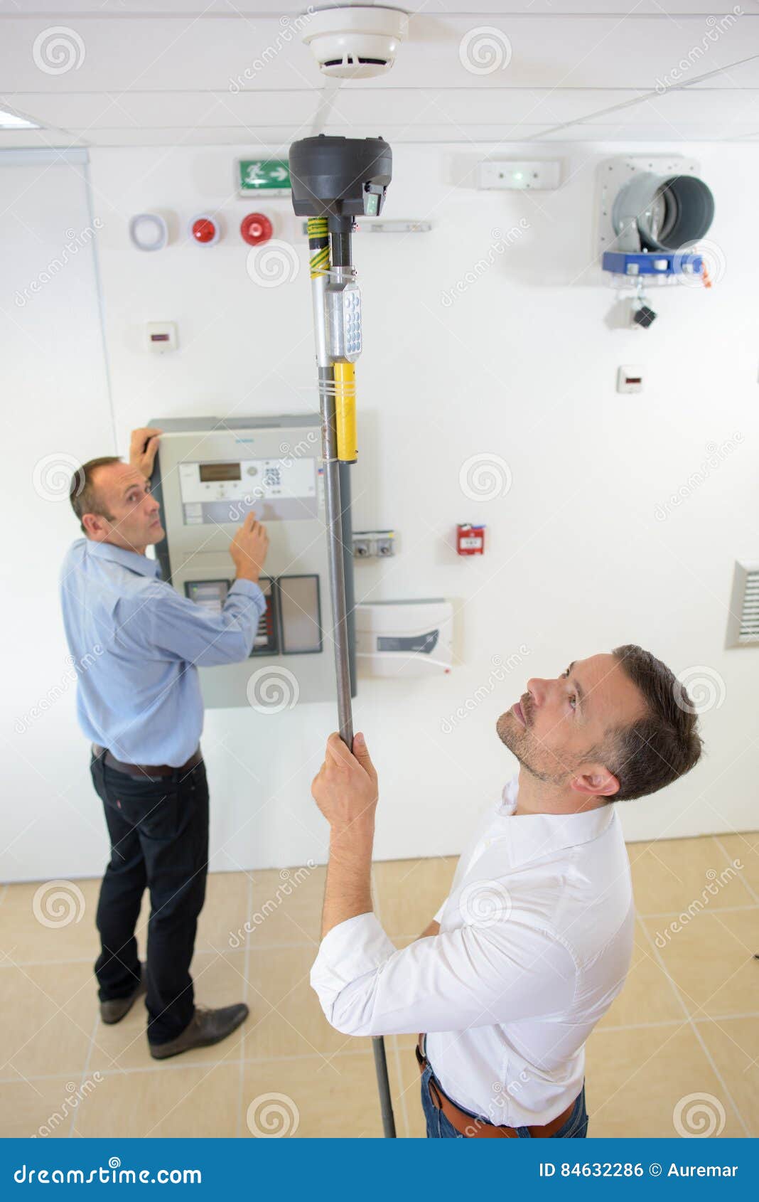 Product Inspectors Testing Smoke Detector Stock Photo - Image of ...
