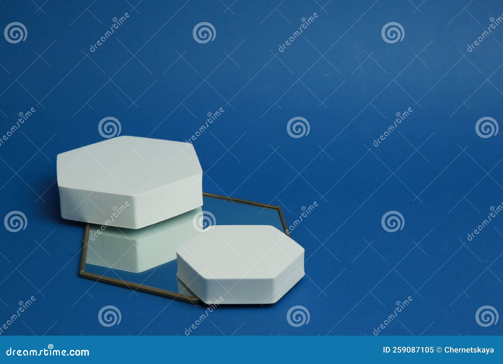 Product Photography Props. Hexagonal Shaped Podiums and Mirror on Blue ...
