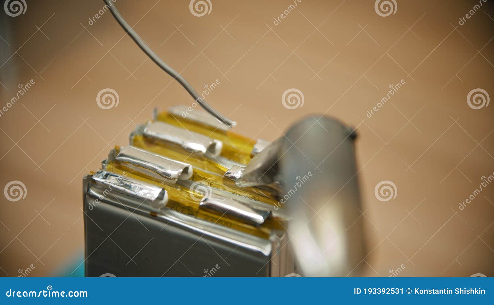 The Production of Batteries - Close Up of Man Making an Accumulator ...