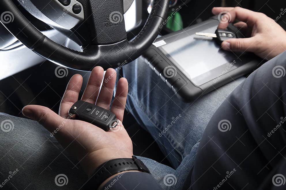 Production of Car Keys, Programming of Car Keys and Repair Stock Photo ...