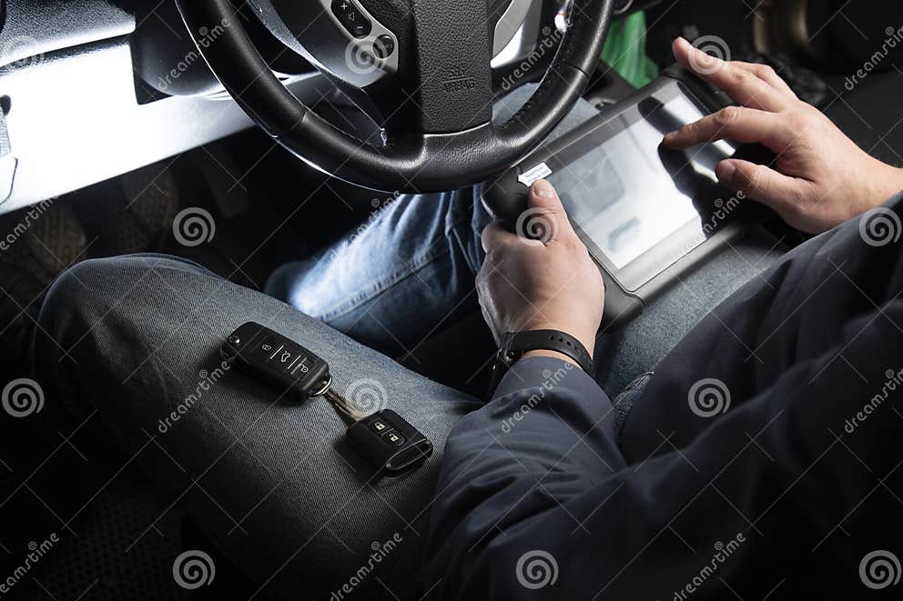 Production of Car Keys, Programming of Car Keys and Repair Stock Image ...