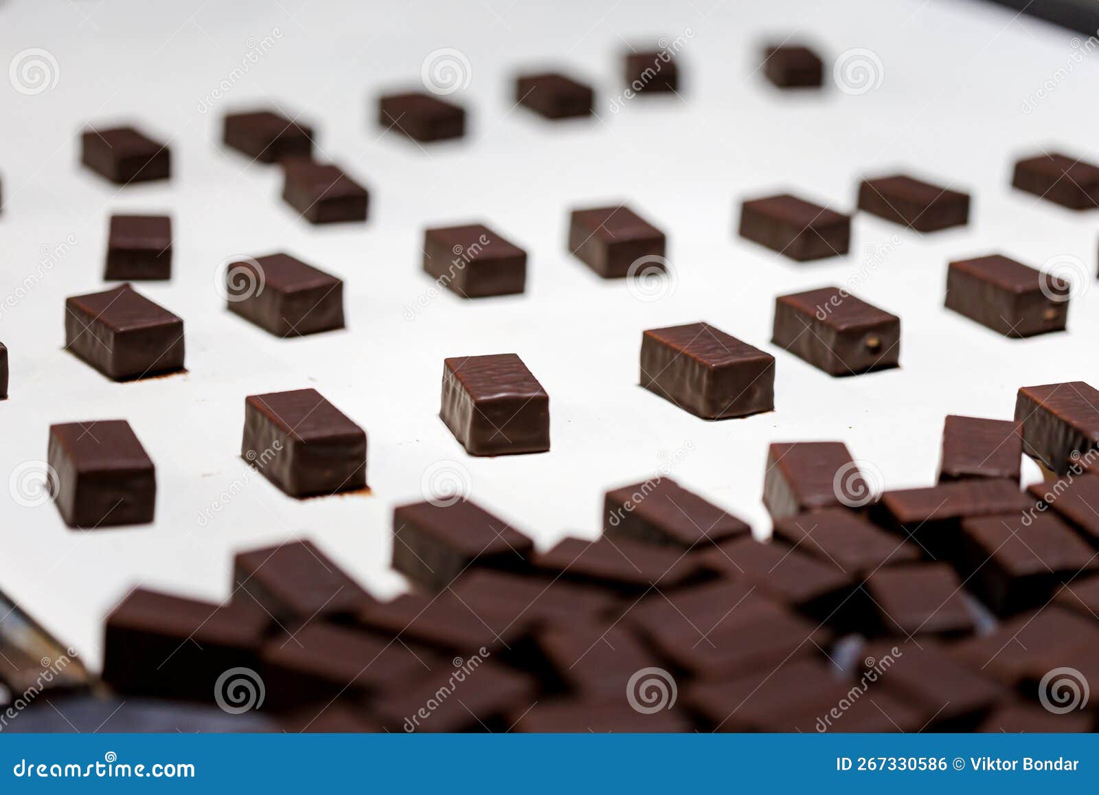 Production of Chocolate Candy. Sweets on Conveyor Belt at Factory Stock ...