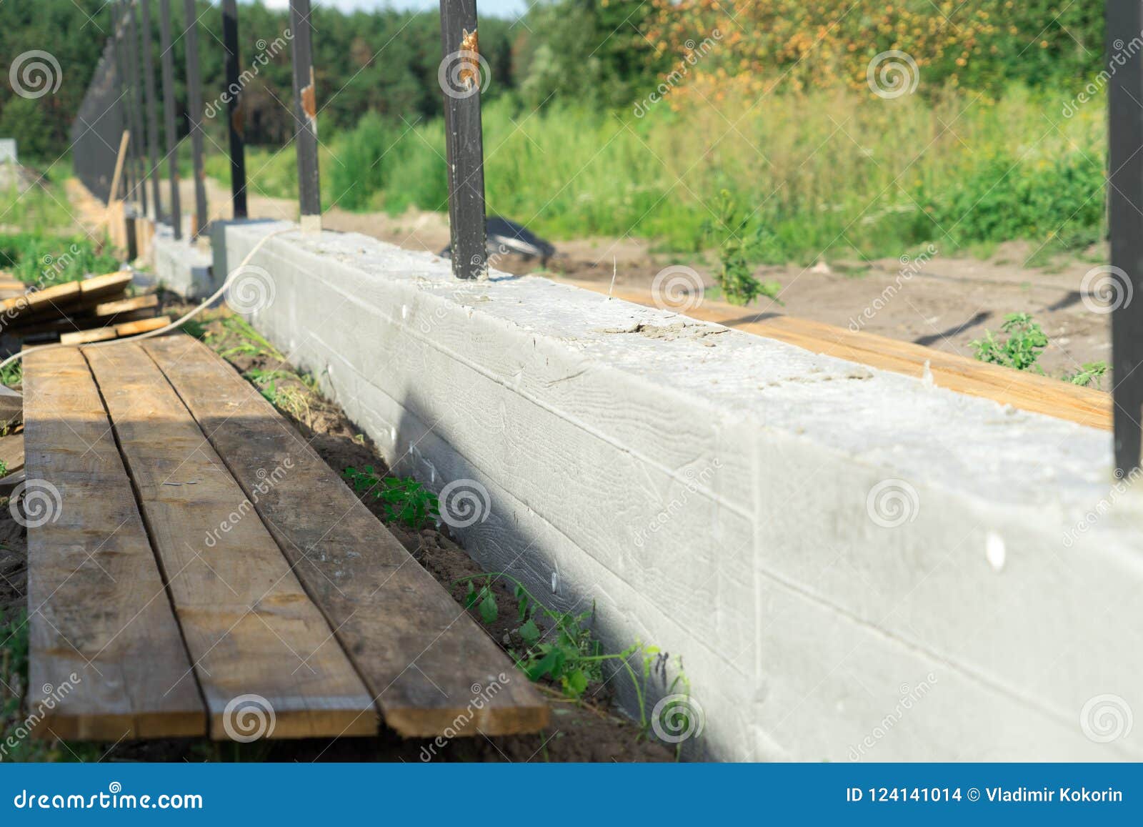 Production of the Concrete Base for a Fence. Stock Photo - Image of ...